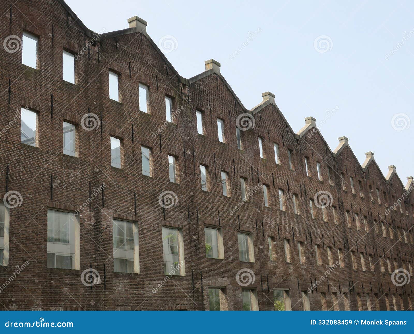 Row Of Facades In Brick Stones With Empty Window Sills Royalty-Free ...