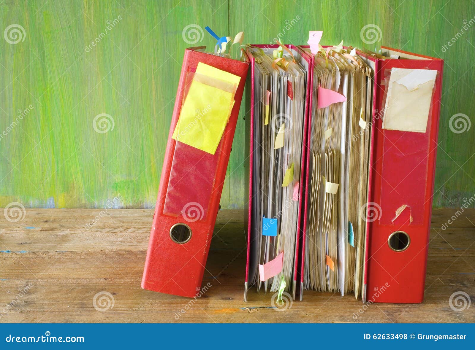 Row of File Folders with Messy Documents Stock Photo - Image of ...