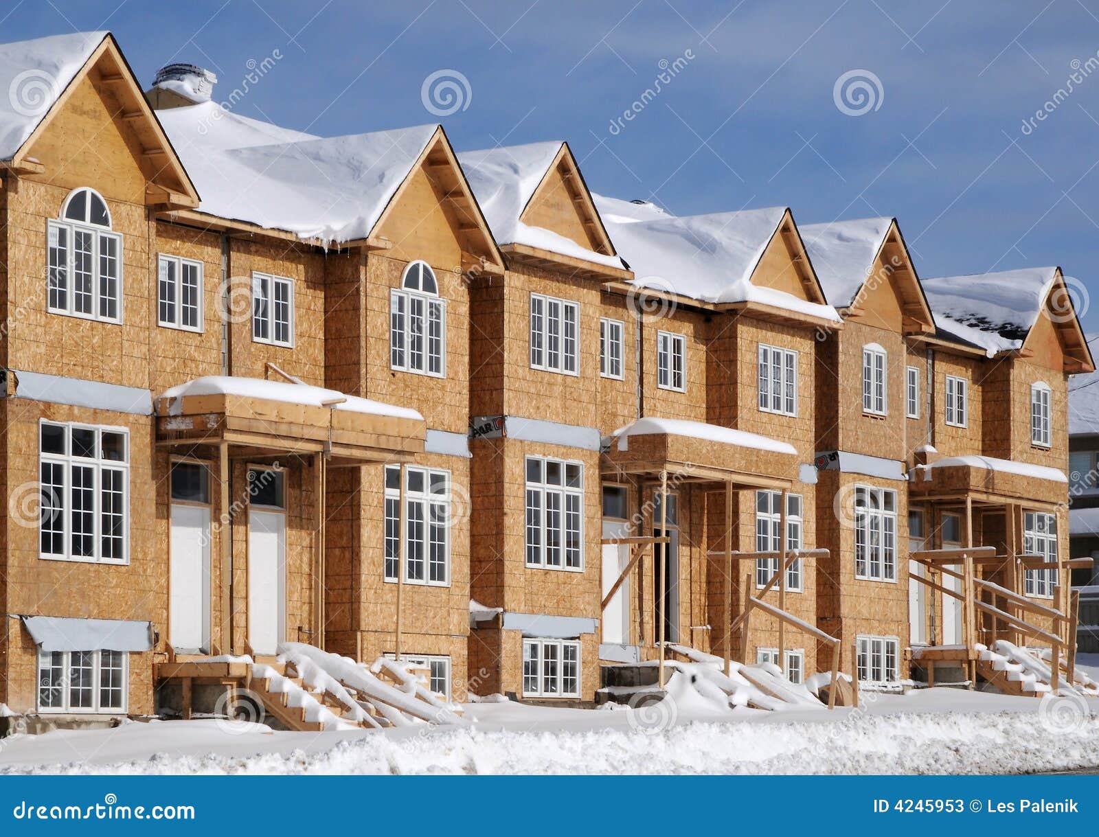 Row of almost Finished Houses Stock Image - Image of snow, construction ...