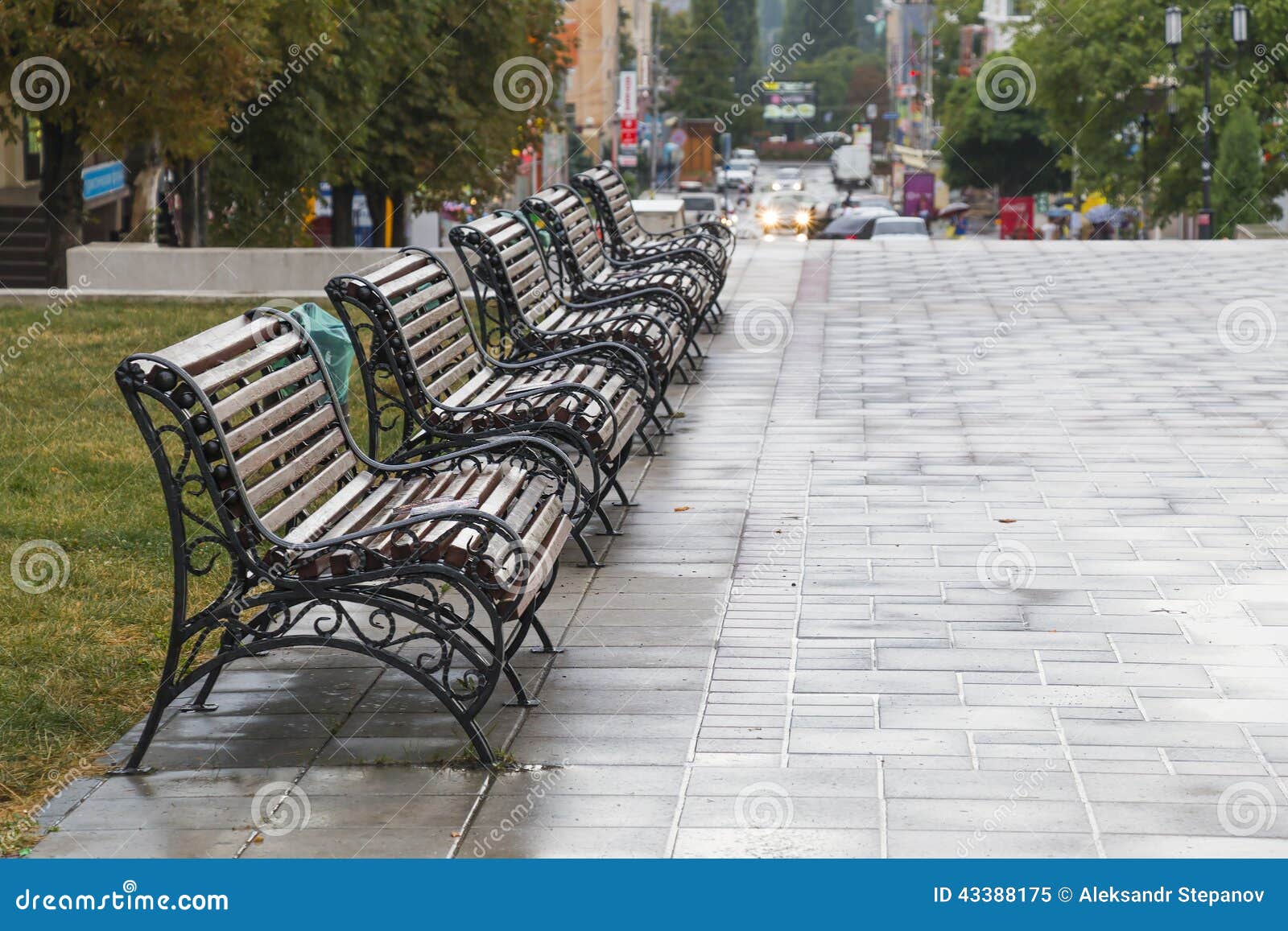Row of Five Benches on the Street in the Rain Stock Image - Image of ...