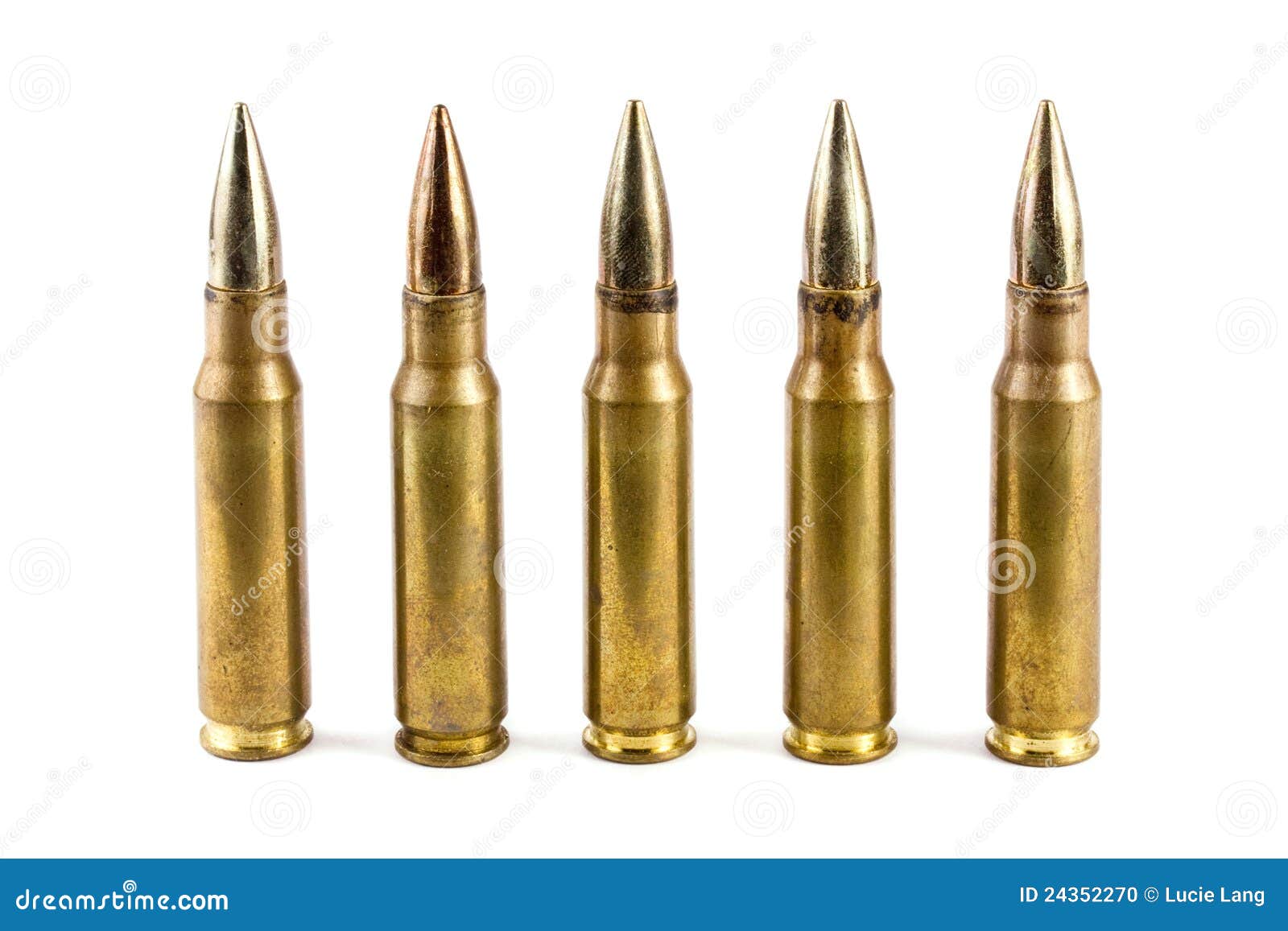 Row of five rifle bullets stock photo. Image of full - 24352270