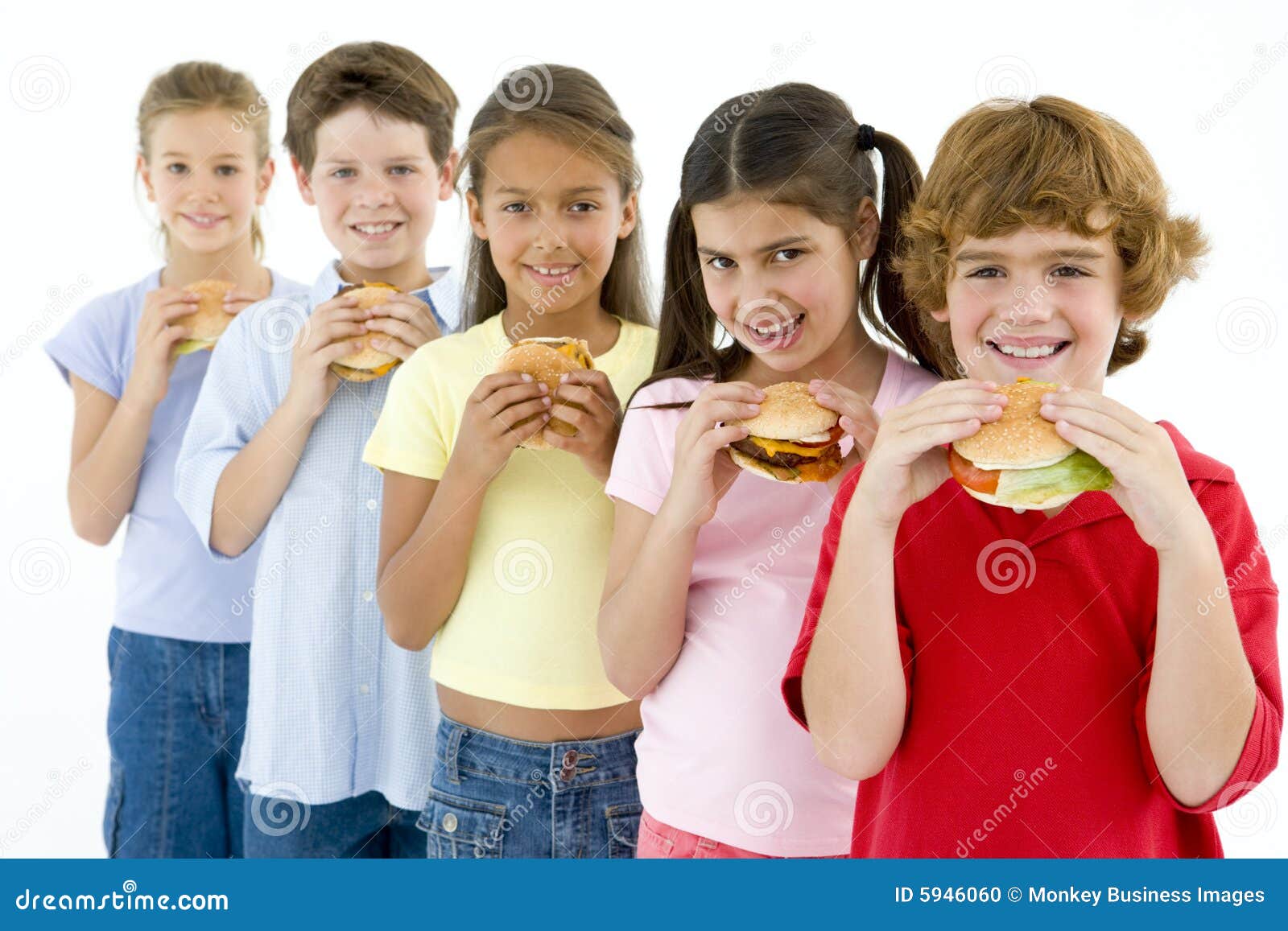 Row of Five Young Friends Eating Hamburgers Stock Photo - Image of ...