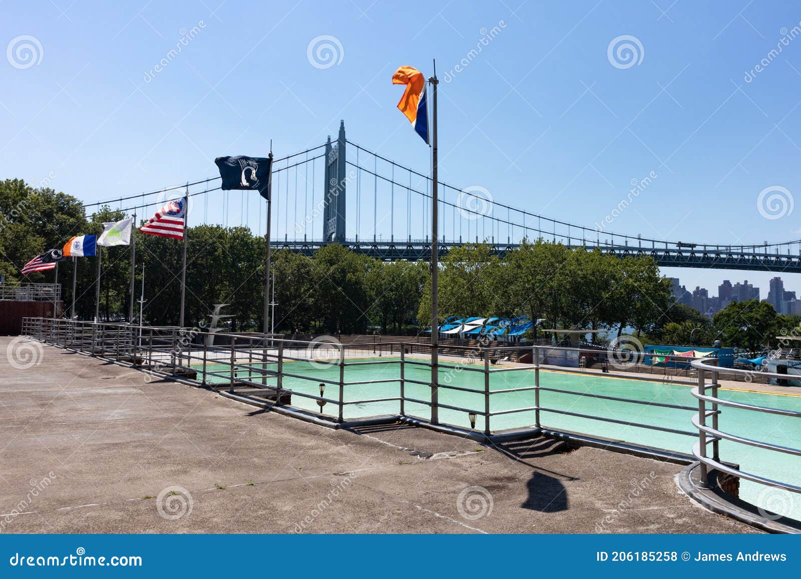 Row of Flags and the Empty Astoria Park Pool during Summer with the ...