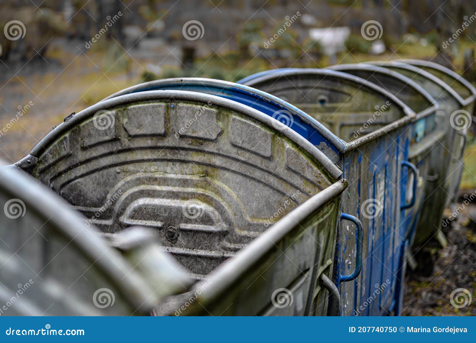 A Row Of Galvanized Trash Containers. Garbage Containers In The Park ...