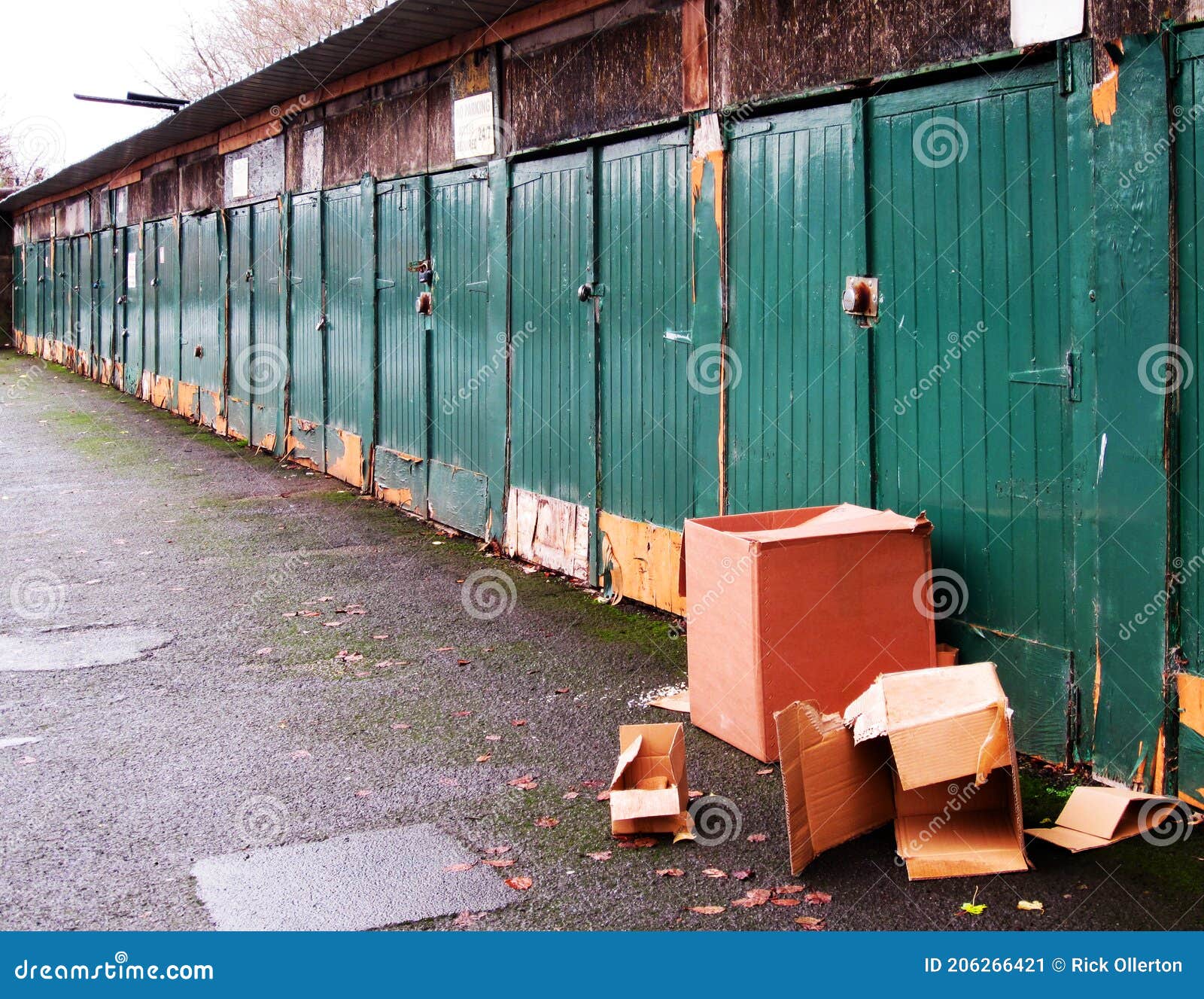 Row of garage doors stock image. Image of cardboard - 206266421