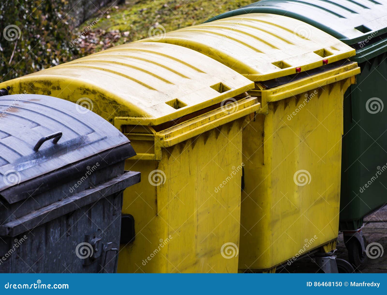 Row of Garbage Cans for Waste Separation Stock Photo - Image of ...