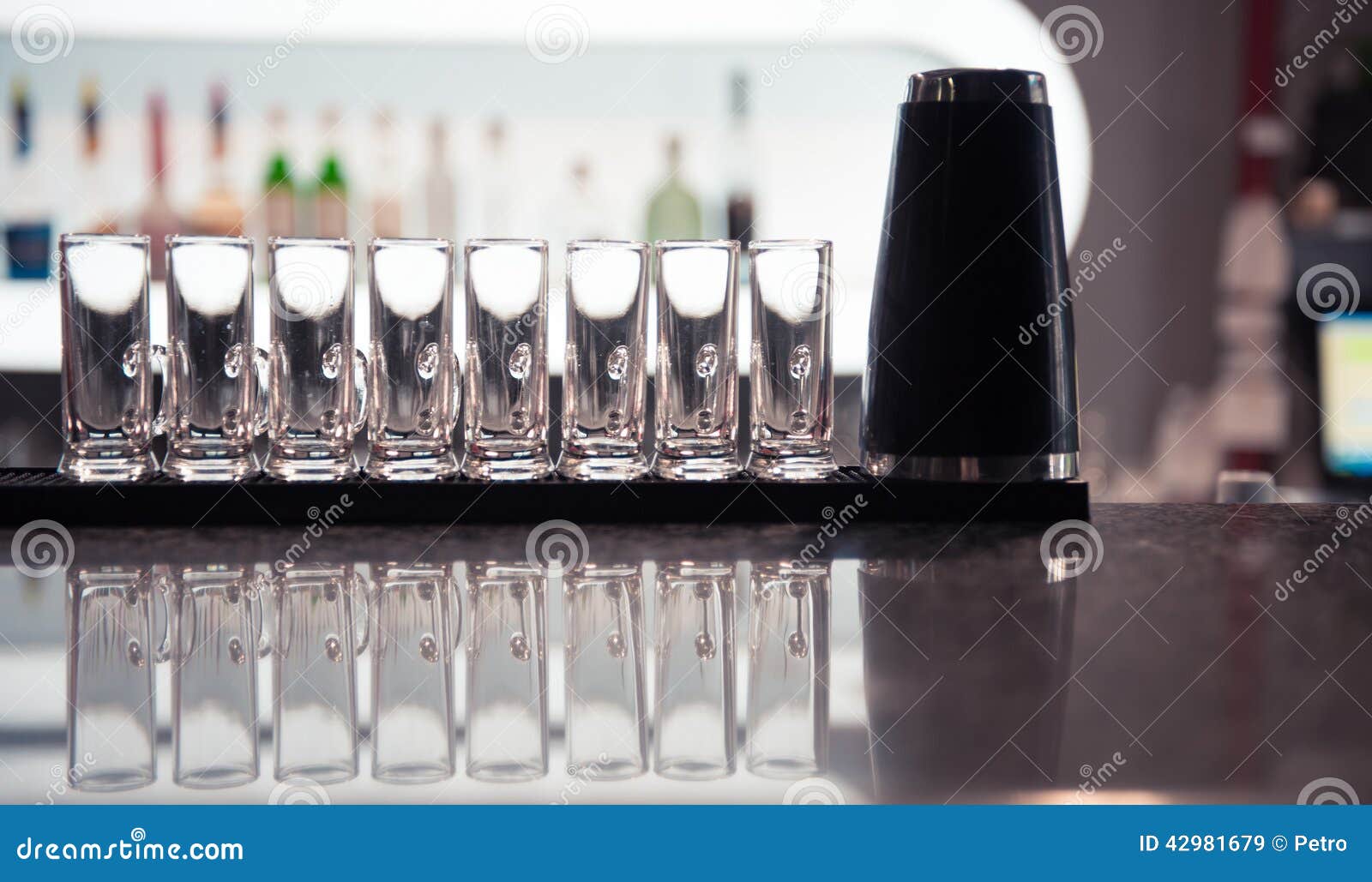Row of glass shots at bar stock image. Image of alcohol - 42981679