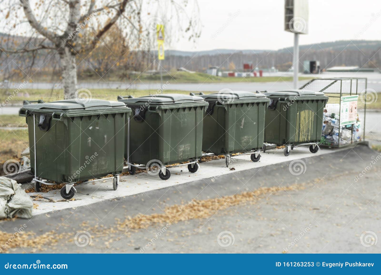 Row of Green Plastic Bin and Plastic Waste Collection Box Stock Image ...