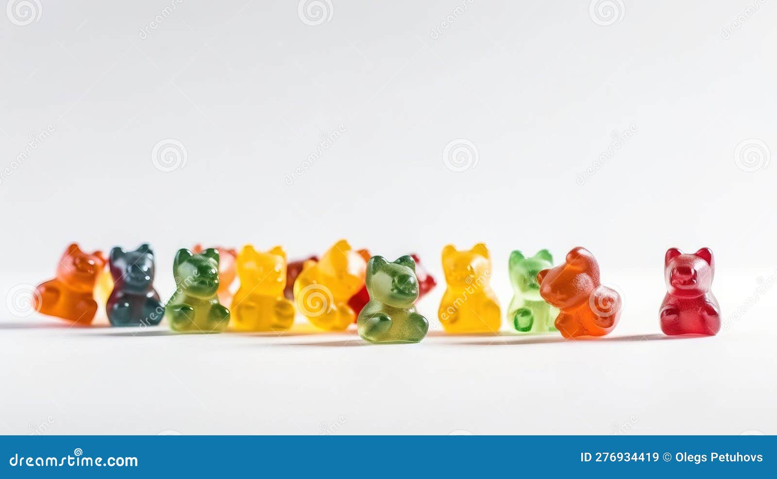 A Row of Gummy Bears Sitting Next To Each Other on a White Surface with ...