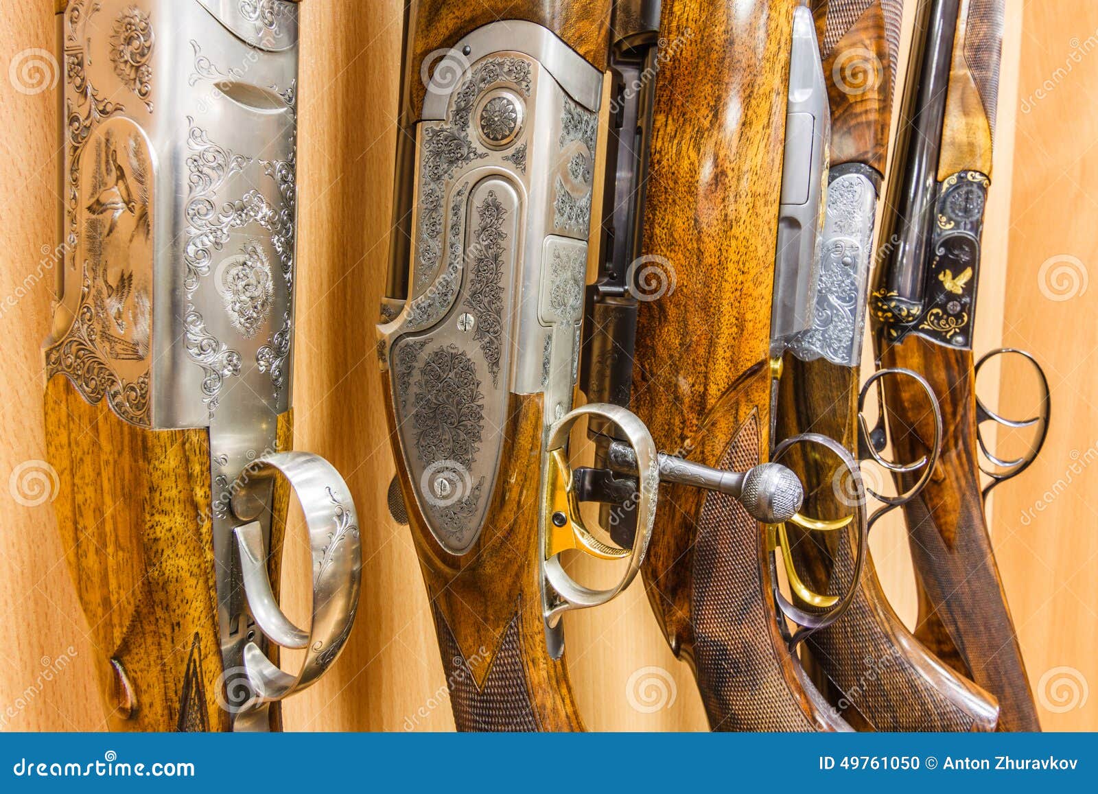 Row of guns in shop stock photo. Image of projectile - 49761050