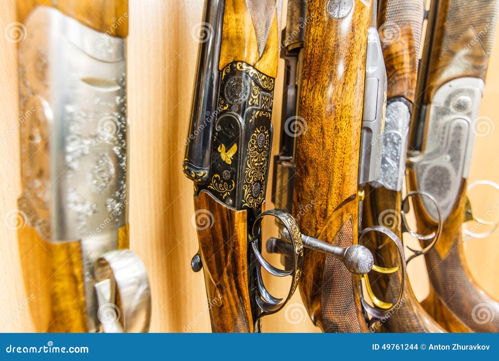 Row of guns in shop stock photo. Image of metal, close - 49761244