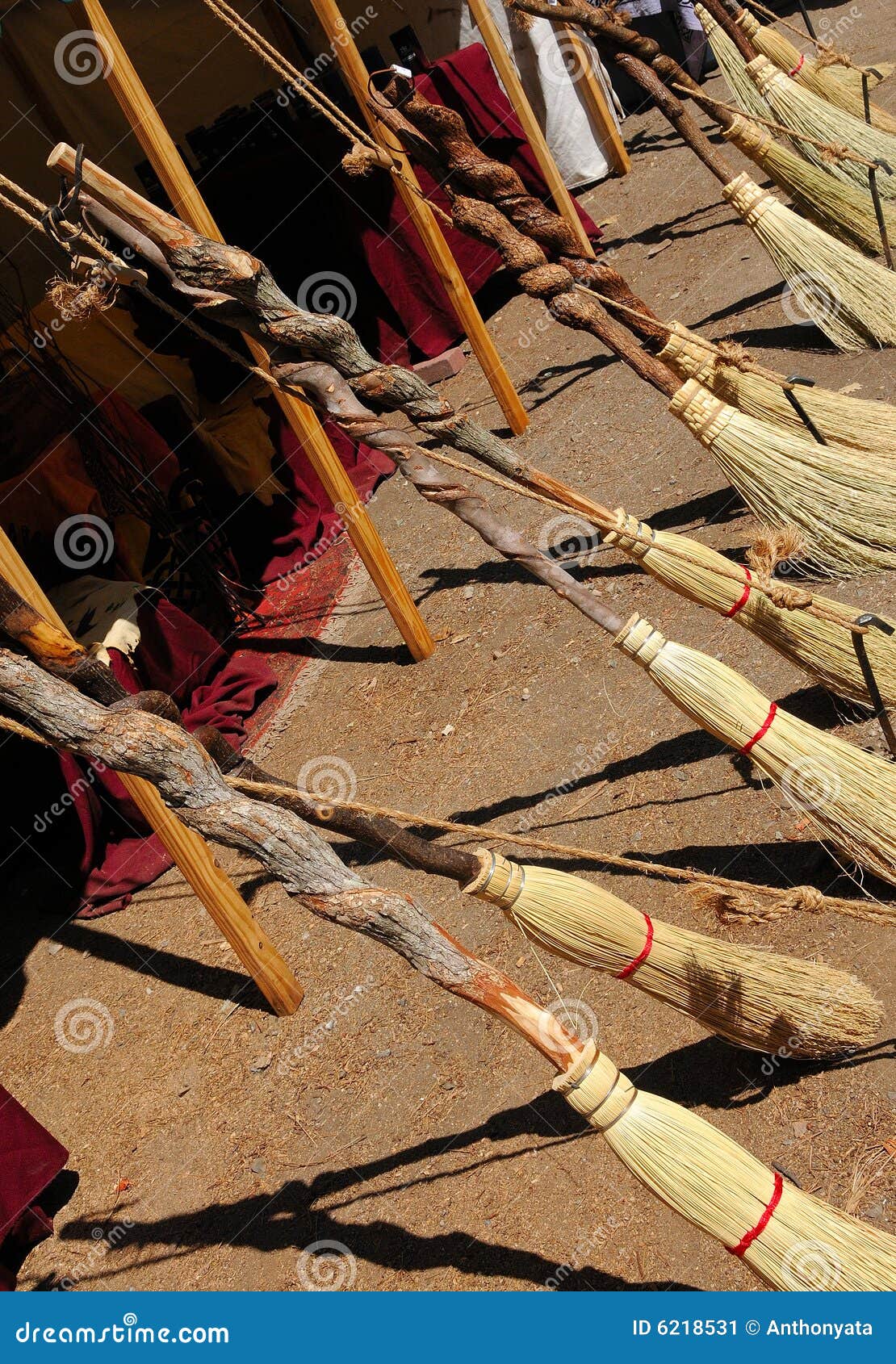 Row of Handcrafted Brooms stock image. Image of outdoor - 6218531