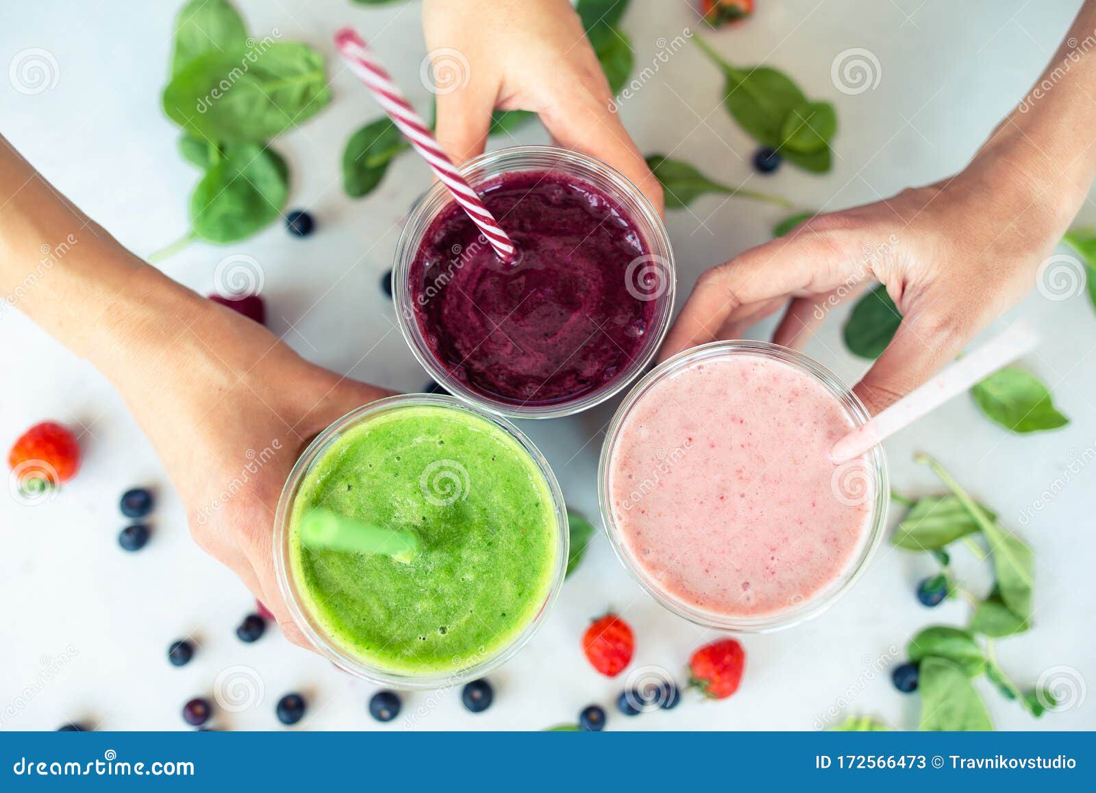 Row of Healthy Fresh Fruit and Vegetable Smoothies with Assorted ...