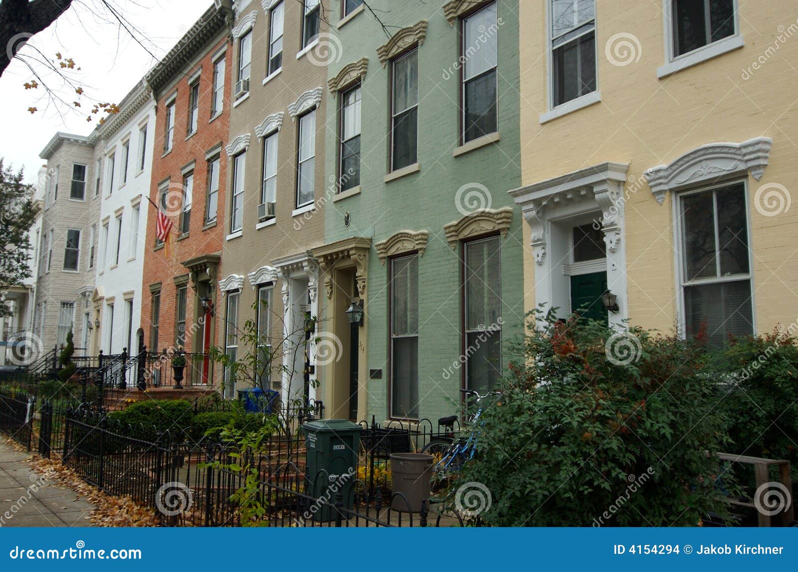 Row houses stock photo. Image of small, roof, yellow, white - 4154294