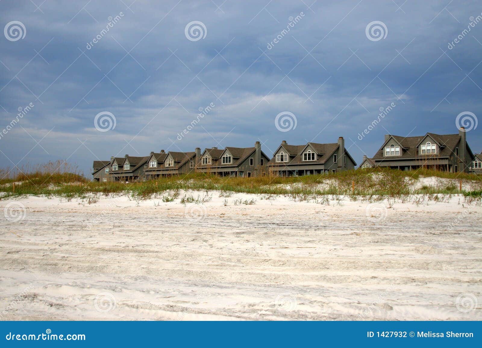 Row of houses by beach stock photo. Image of view, remote - 1427932