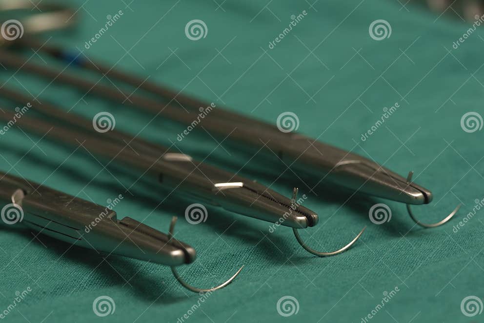 Three Needle Holders and Empty Needles Stock Photo - Image of supplies ...
