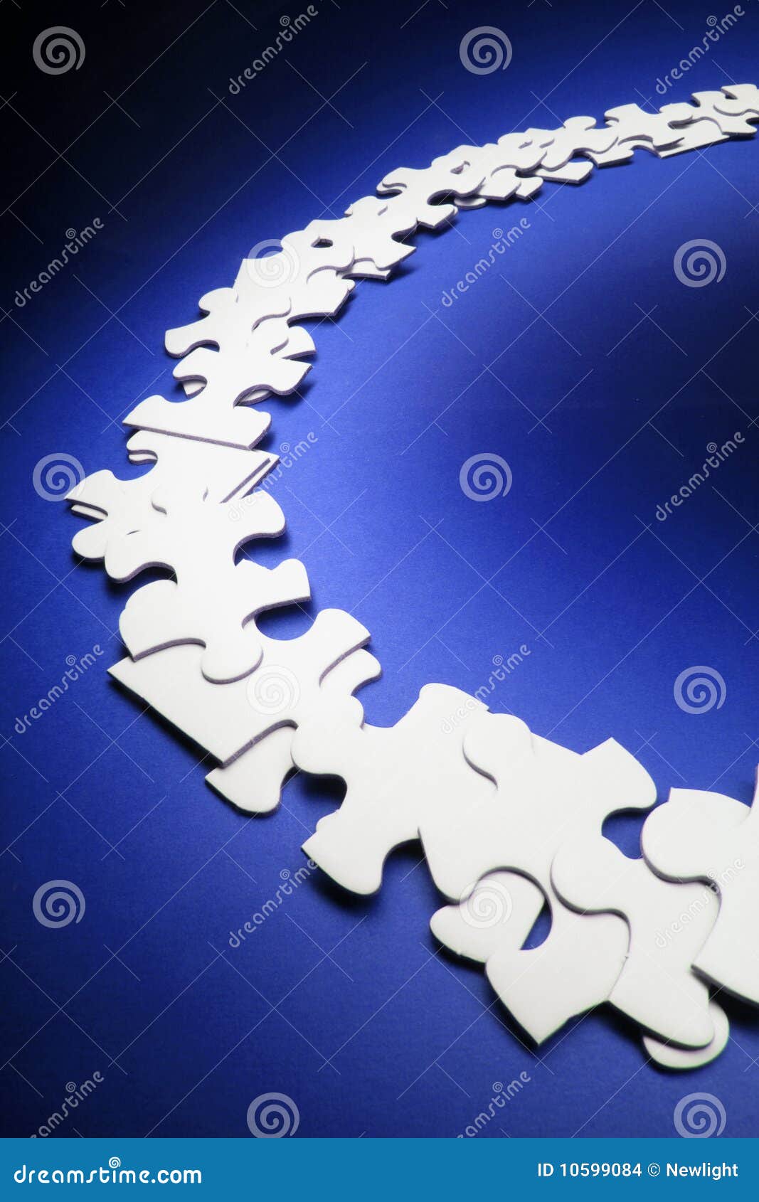 Row of Jigsaw Puzzle Pieces Stock Photo - Image of puzzle, shot: 10599084
