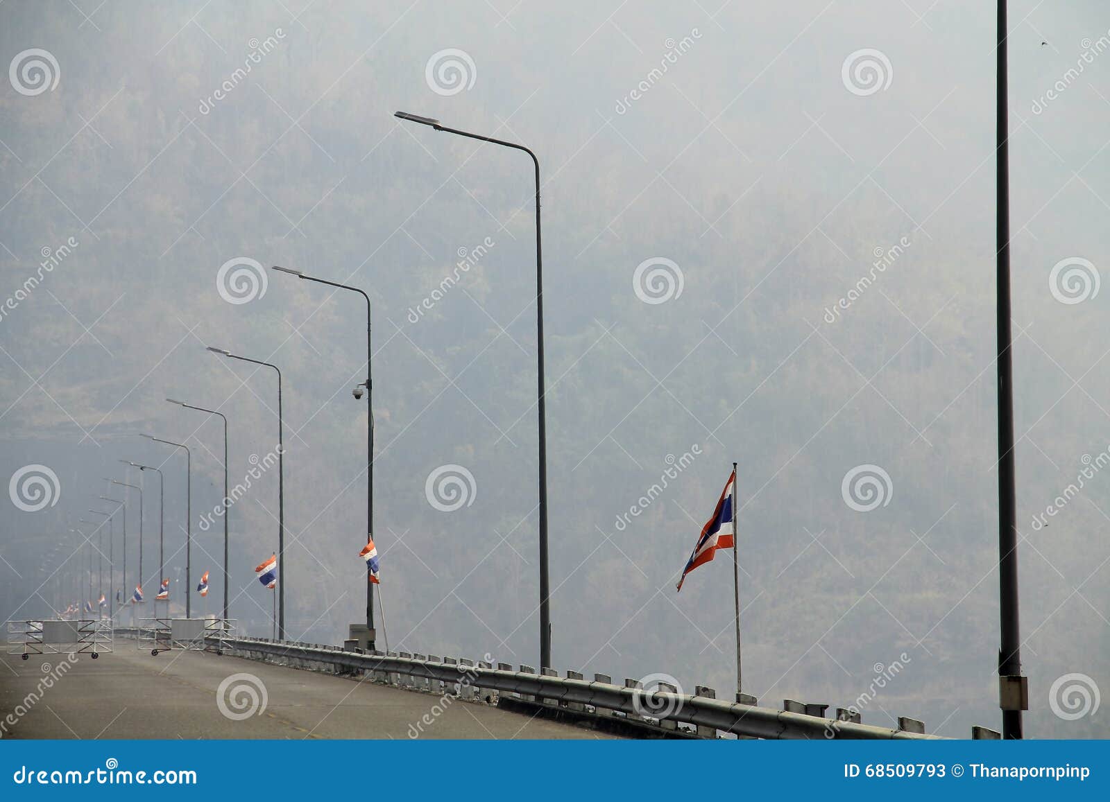 Row of Lampposts Along the Road. Stock Image - Image of holding ...