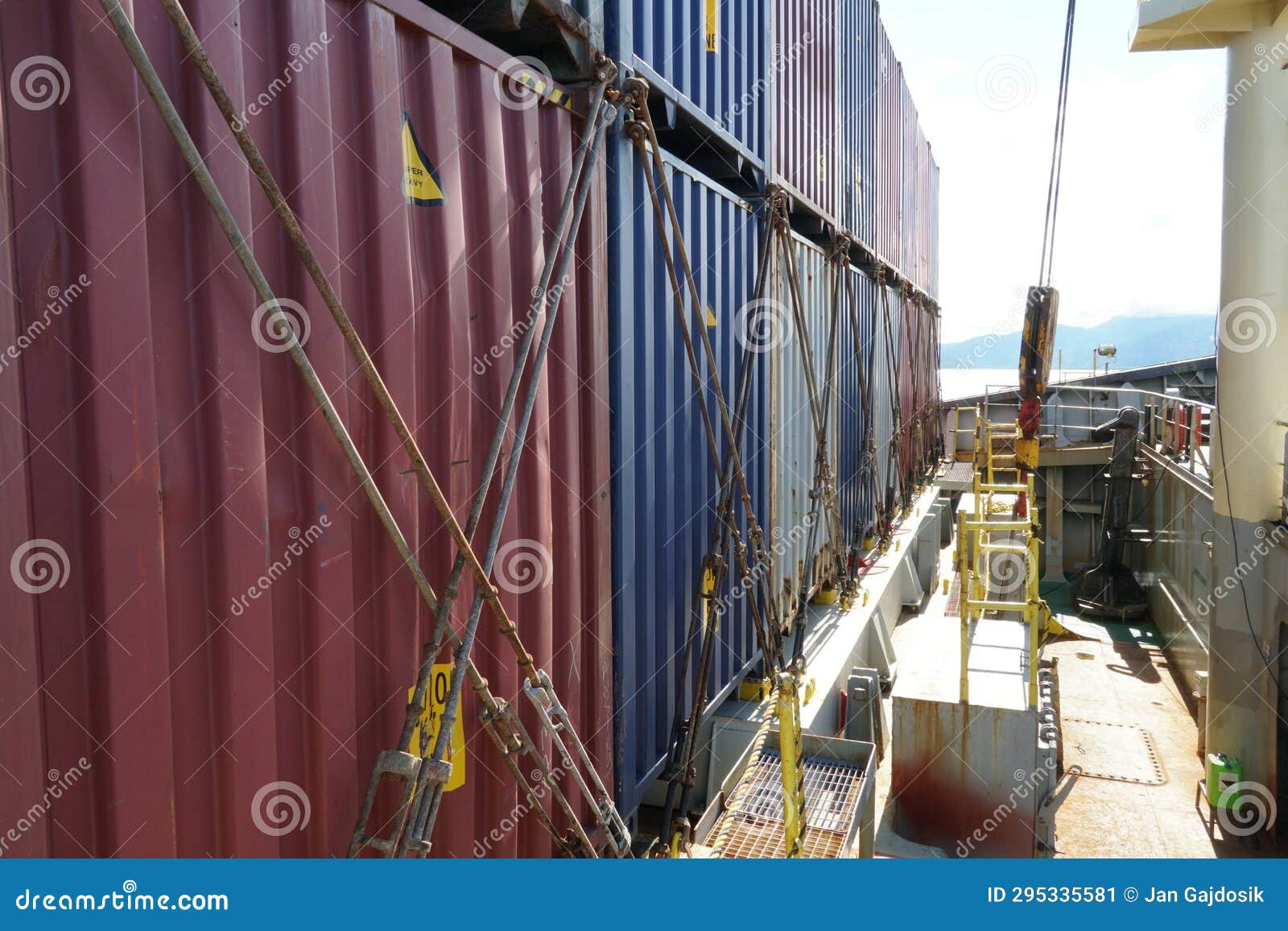 Row of Lashed Containers in a Line with Bars and Twist Locks Situated ...