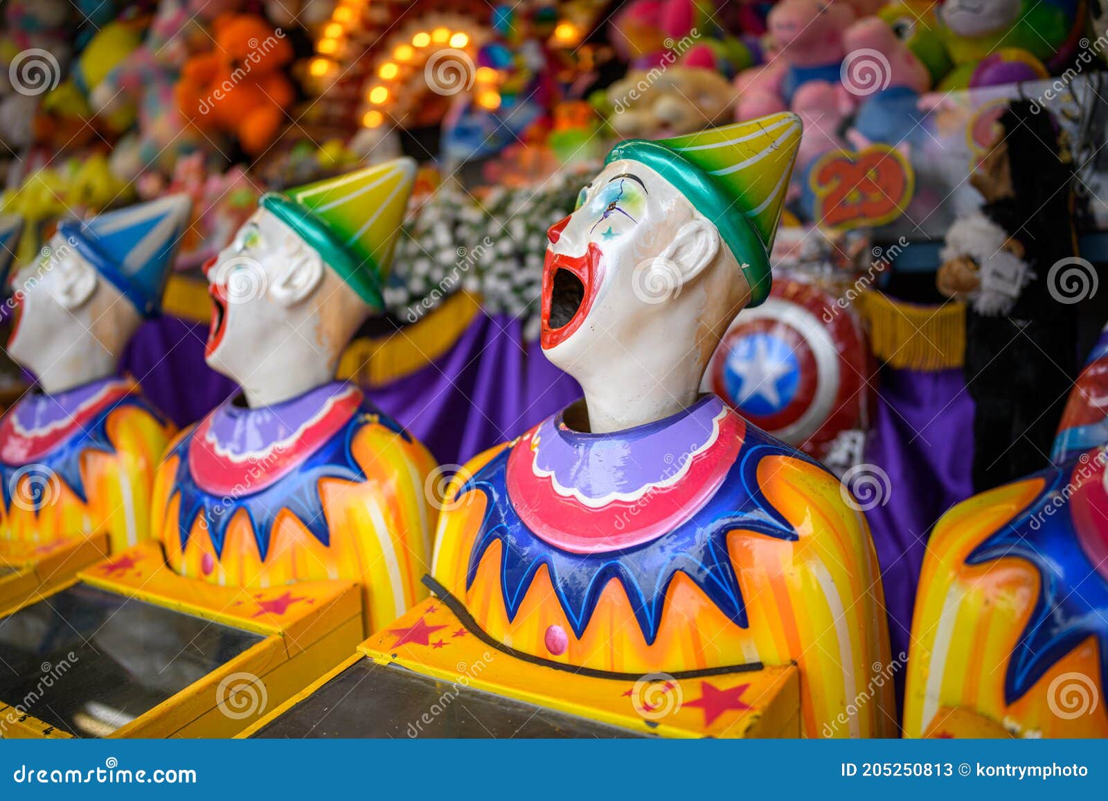 A Row of Laughing Clown Faces Stock Image - Image of fairground ...