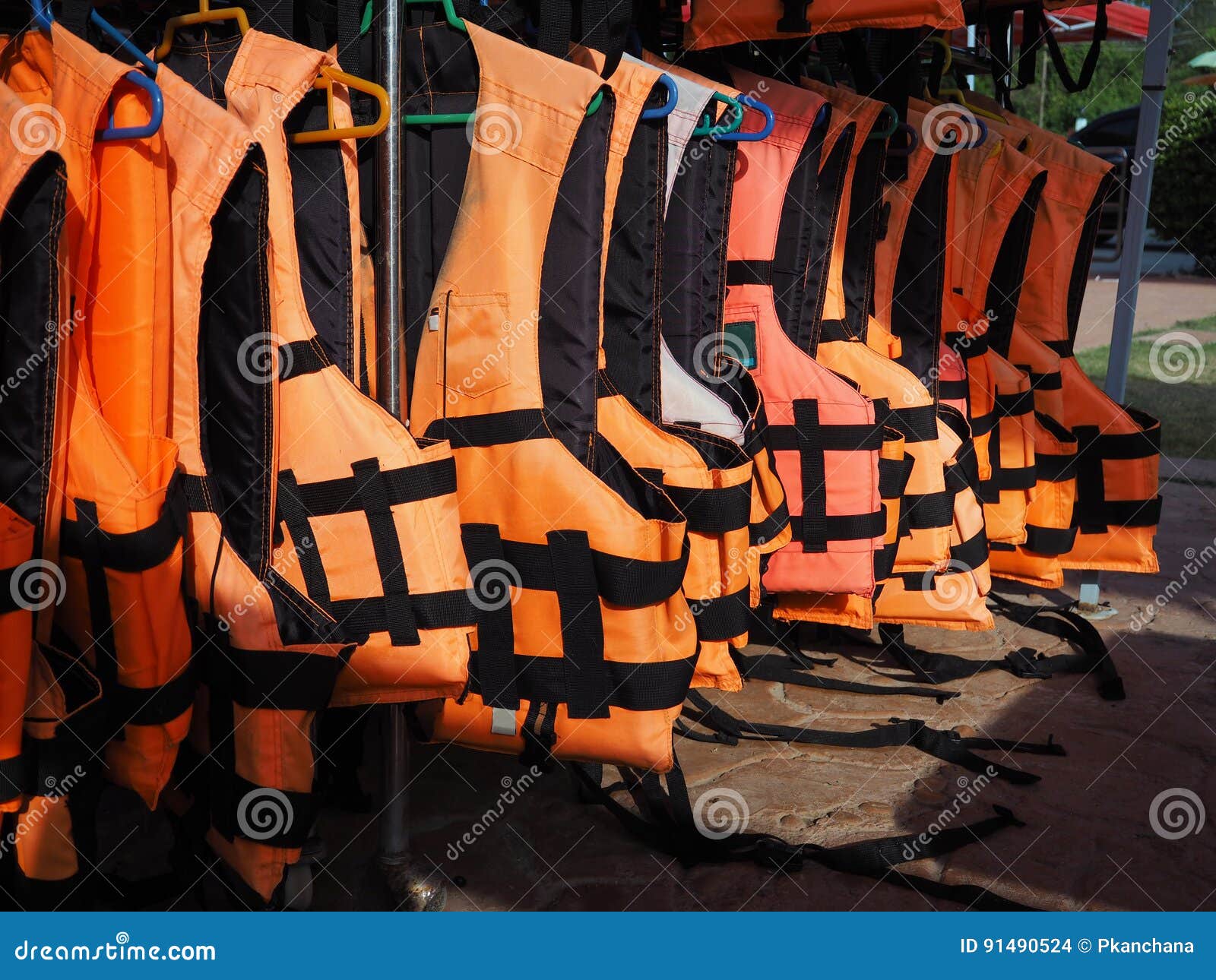 Row of Life Jackets or Life Vests for Tourist. Stock Photo - Image of ...
