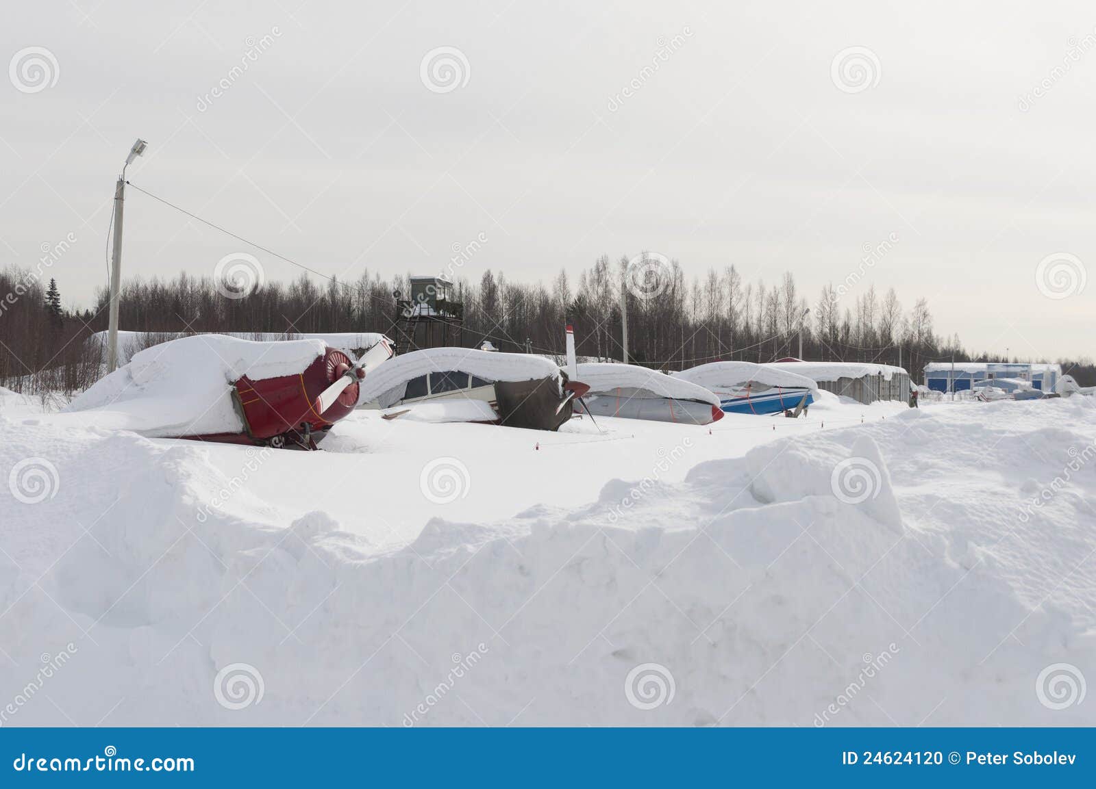 Row of Light Aircrafts Under Snow Stock Photo - Image of aeroplane ...