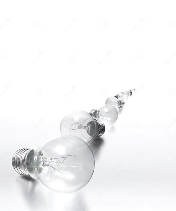 Row of Light Bulbs - Shallow DOF Stock Photo - Image of positive ...