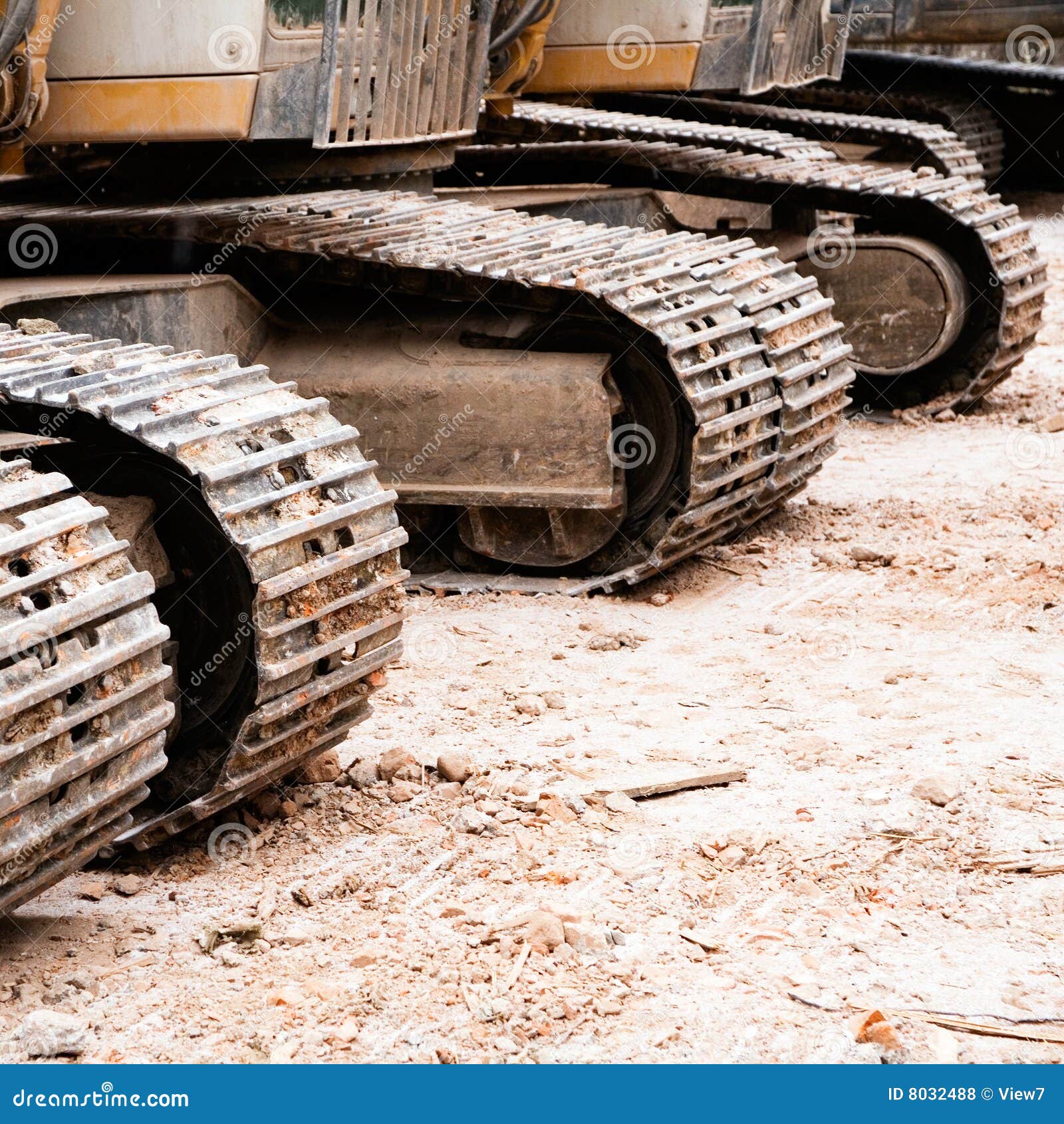Row of loaders and tracks stock photo. Image of track - 8032488