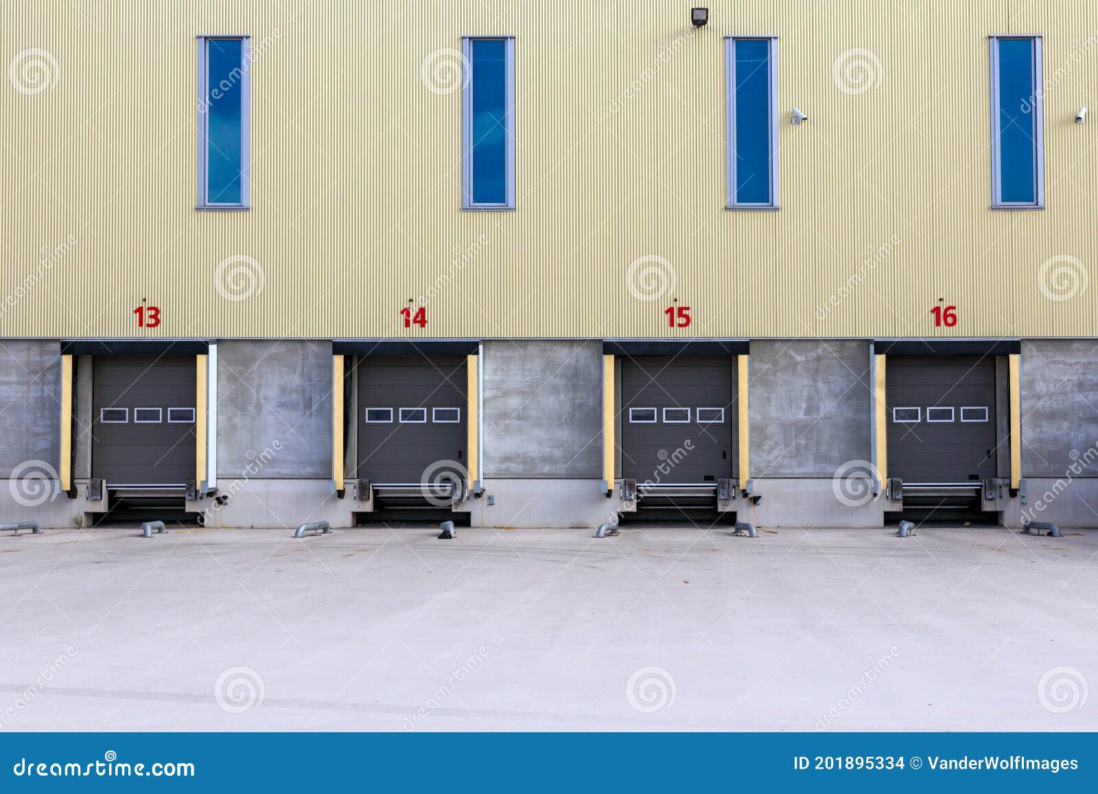 Row of Loading Docks with Shutter Doors at an Industrial Warehouse ...
