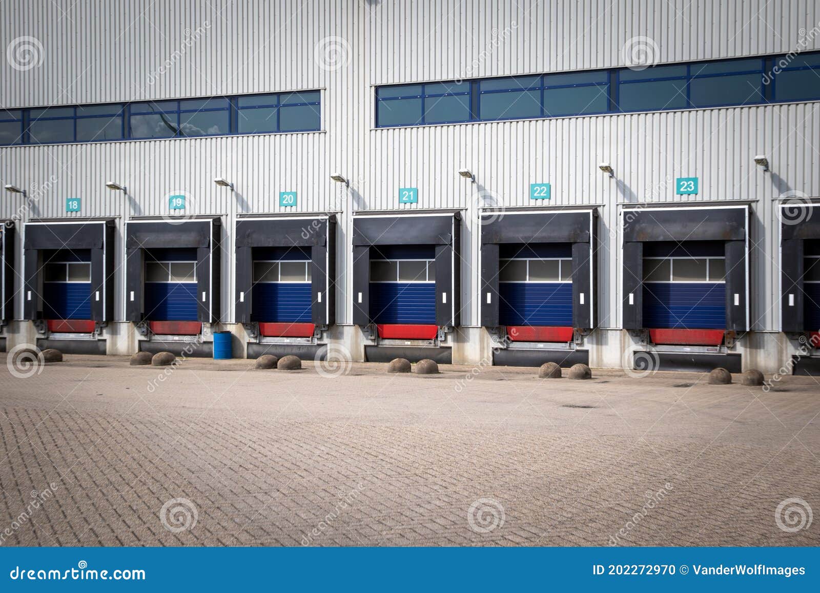 Row of Loading Docks with Shutter Doors at an Industrial Warehouse ...
