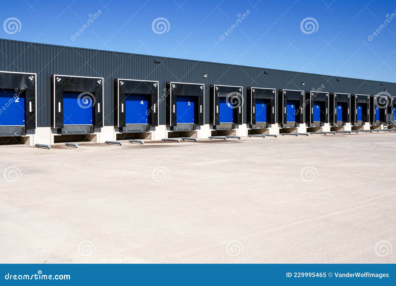 Row of Loading Docks with Shutter Doors at an Industrial Warehouse ...
