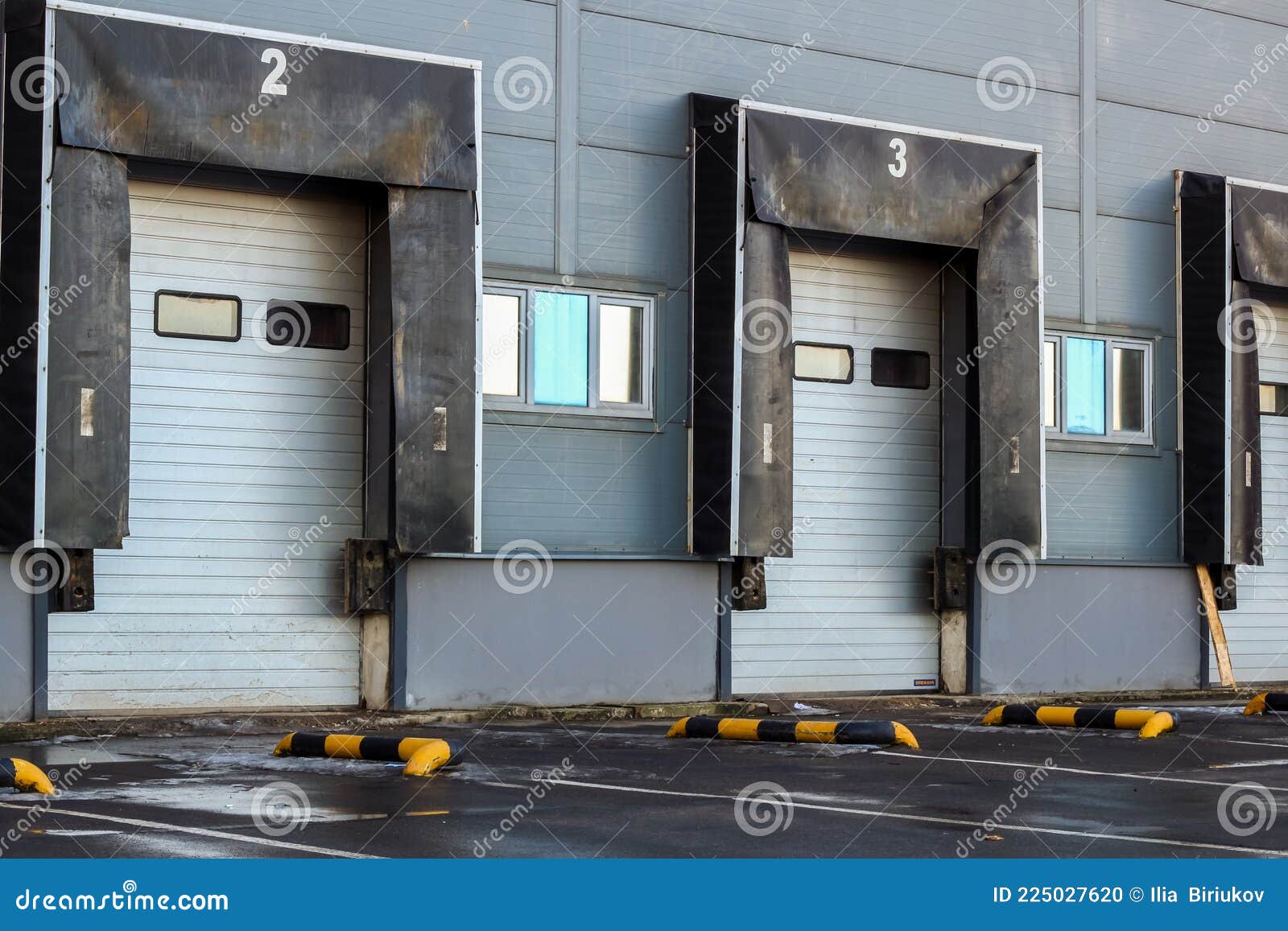 Row of Loading Docks with Shutter Doors at a Warehouse. Warehouse ...