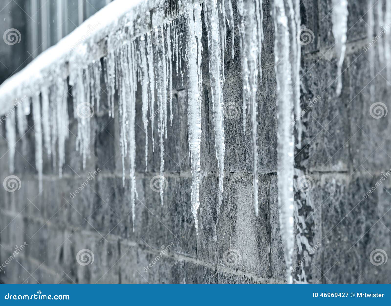 Row of long icicles stock image. Image of shiny, season - 46969427