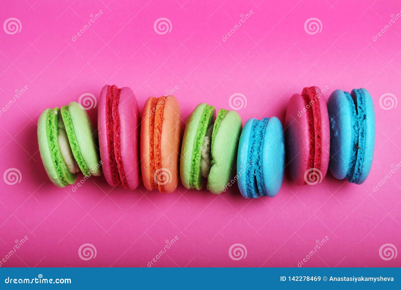 A row of macarons stock image. Image of bright, macarons - 142278469
