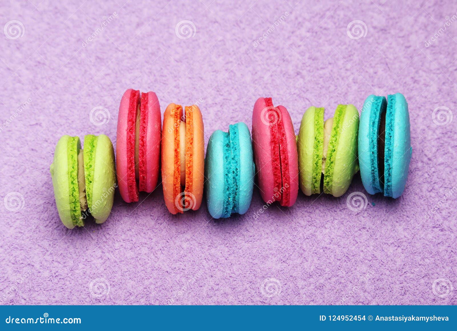 A row of macarons stock photo. Image of food, color - 124952454