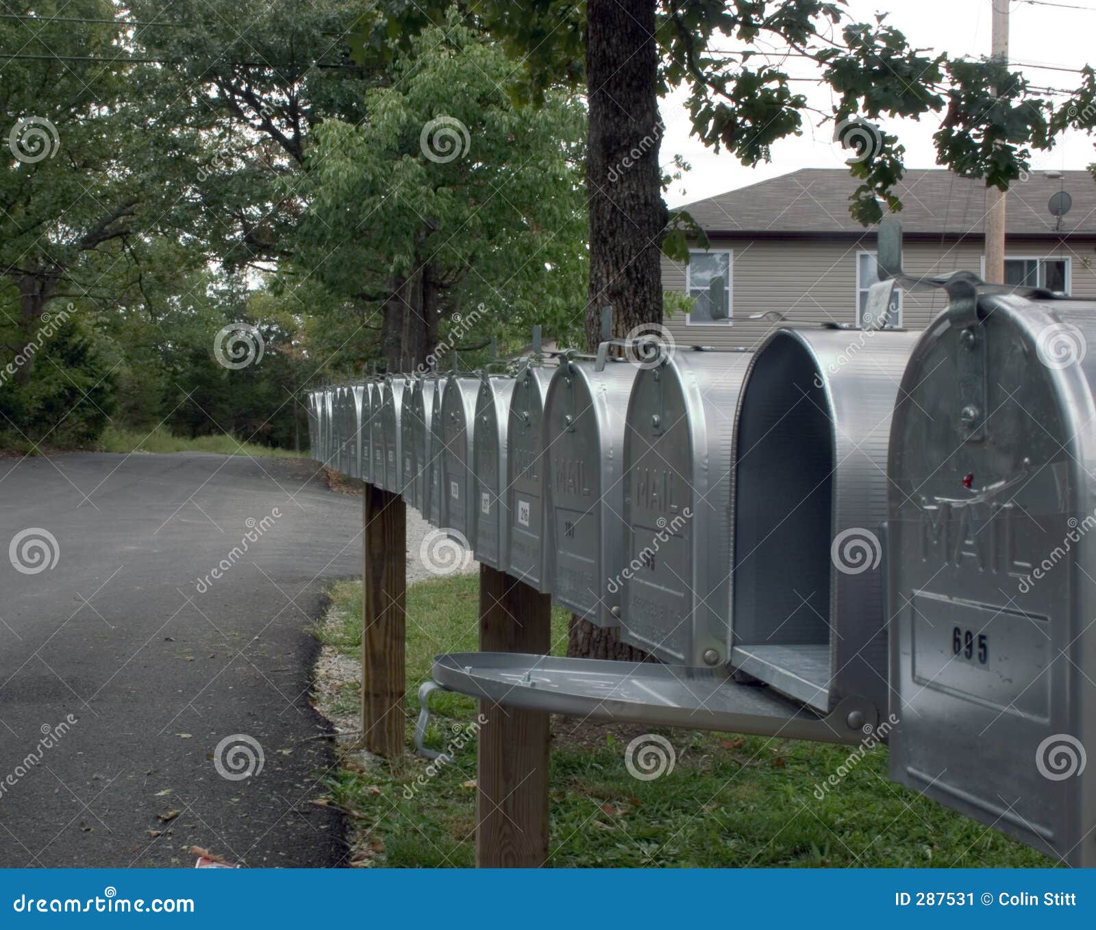 Row of mail boxes 2 stock image. Image of bills, postman - 287531