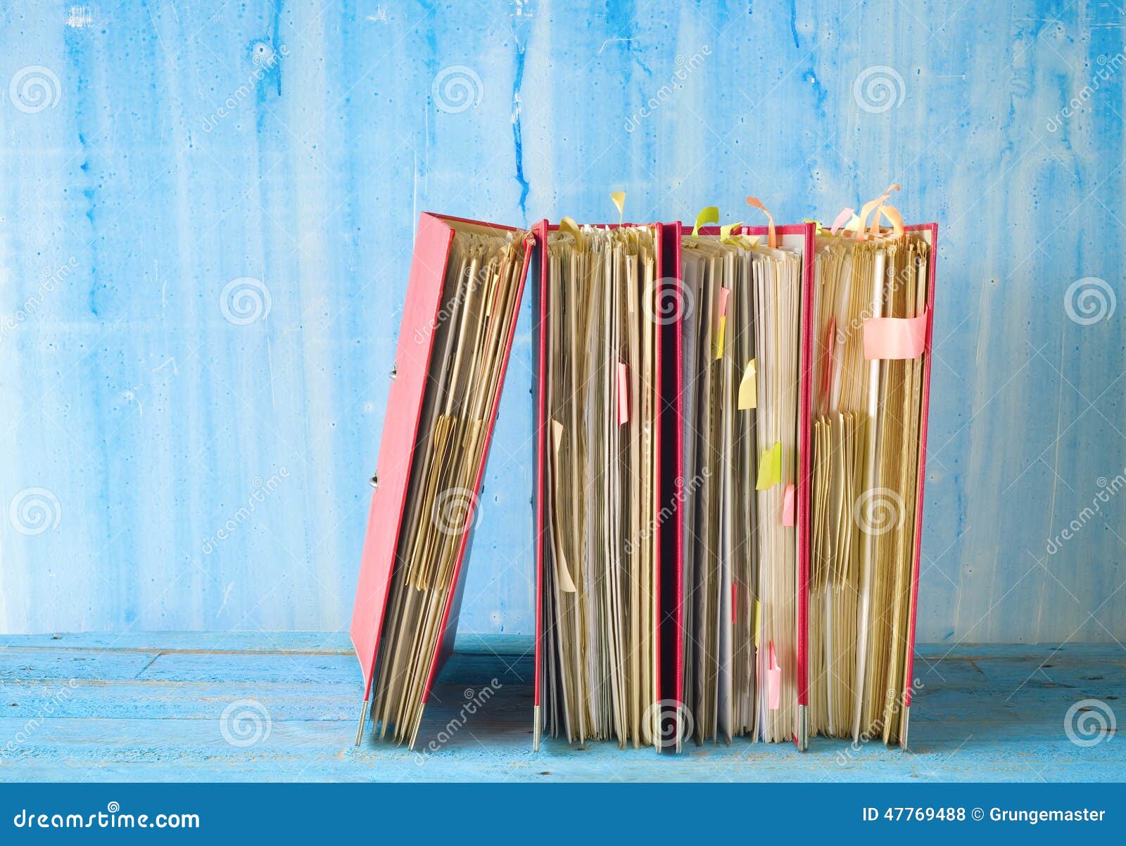 Row of messy file folders stock photo. Image of bills - 47769488