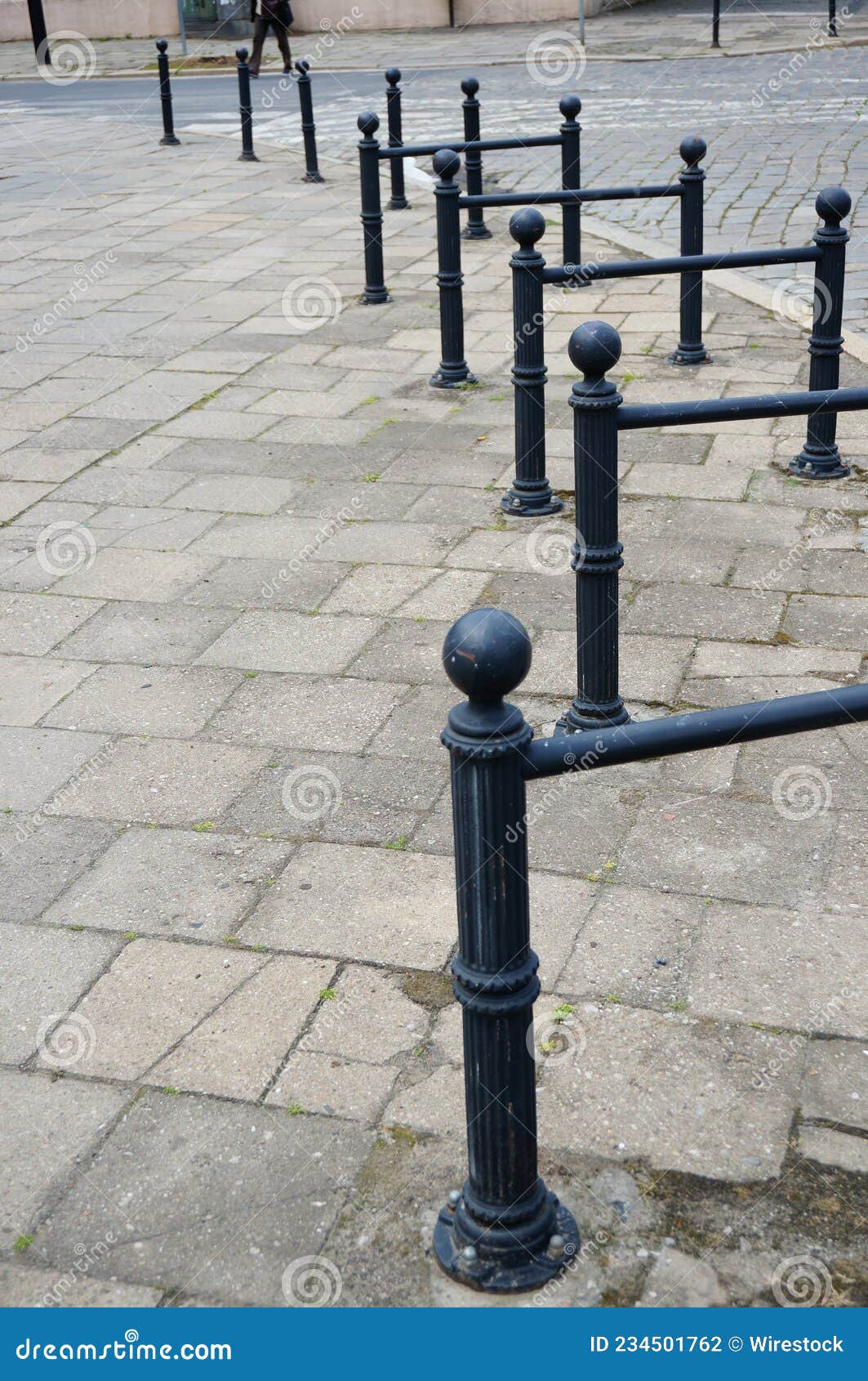 Row of Metal Posts on the Sidewalk Stock Photo - Image of concrete ...