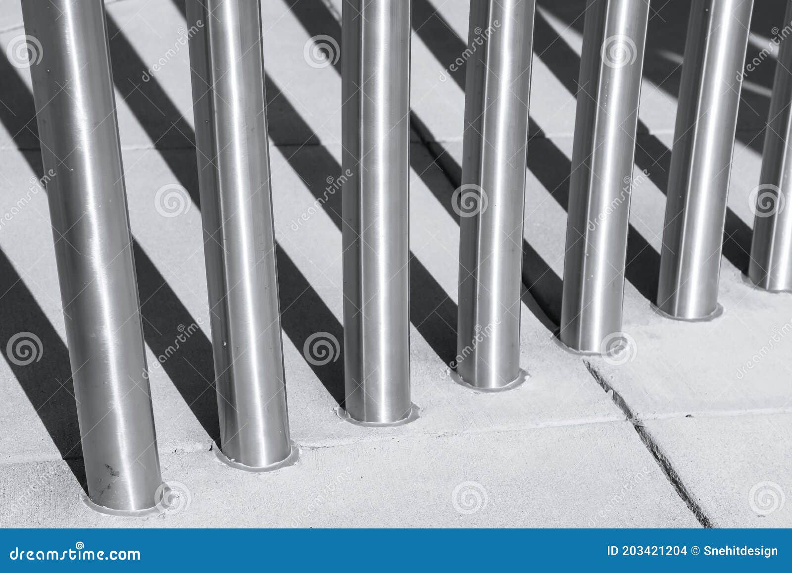 Row of Metal Rods in Concrete Stock Photo - Image of rough, cylindrical ...