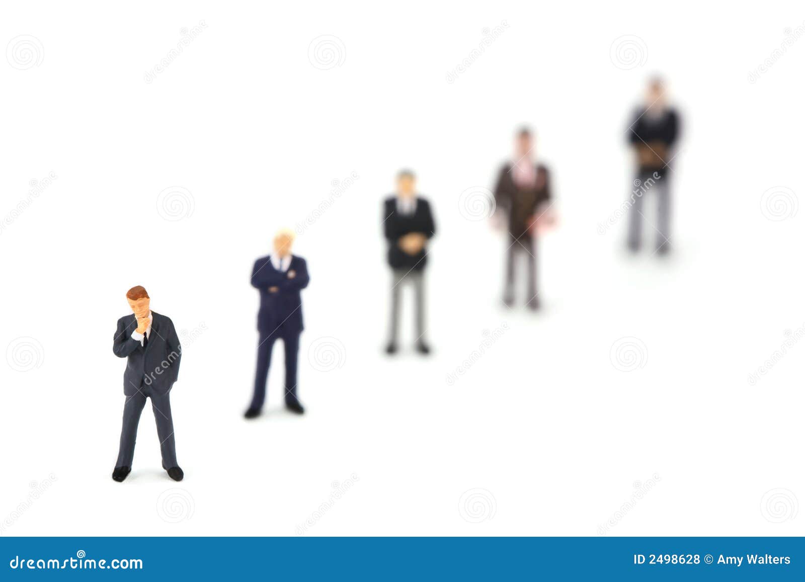 Row of Miniature Business Men Stock Photo - Image of diagonally, crowd ...