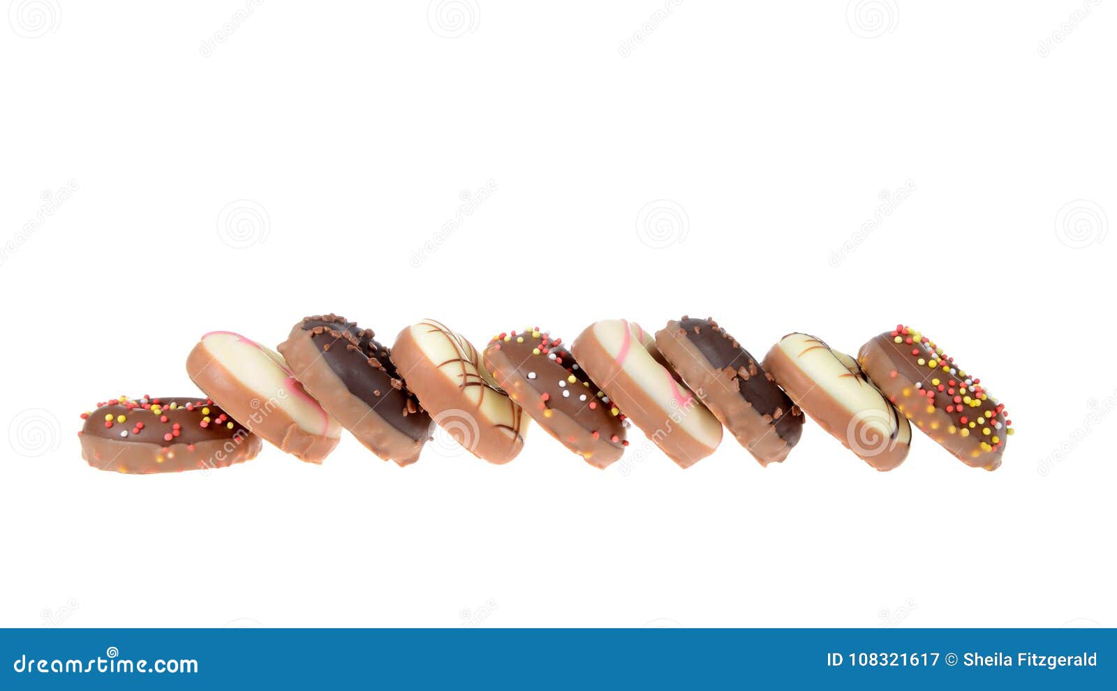 Row of Miniature Donuts Candy Coated Isolated on White Stock Image ...