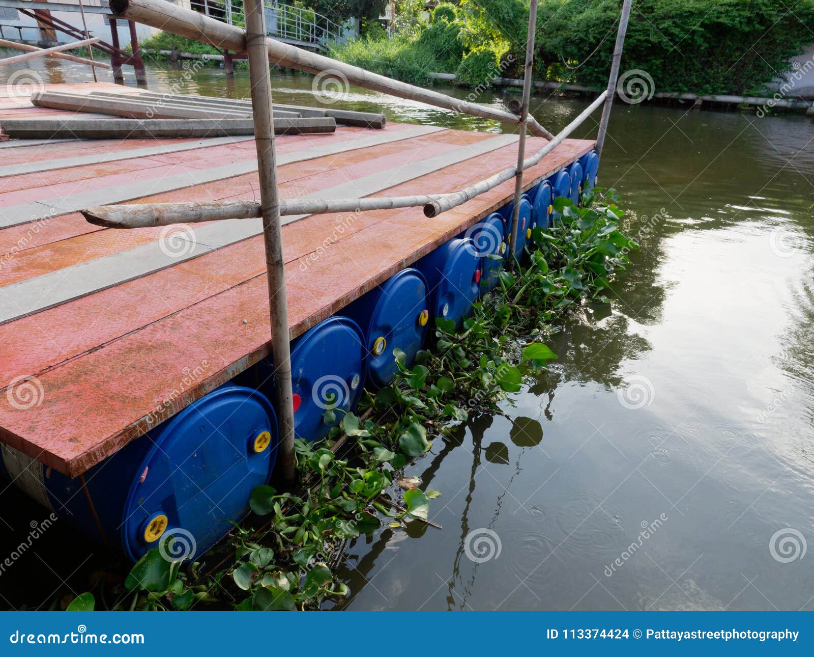 Row of Multi Purpose Blue Plastic Drum, Barrel, or Container Used As ...