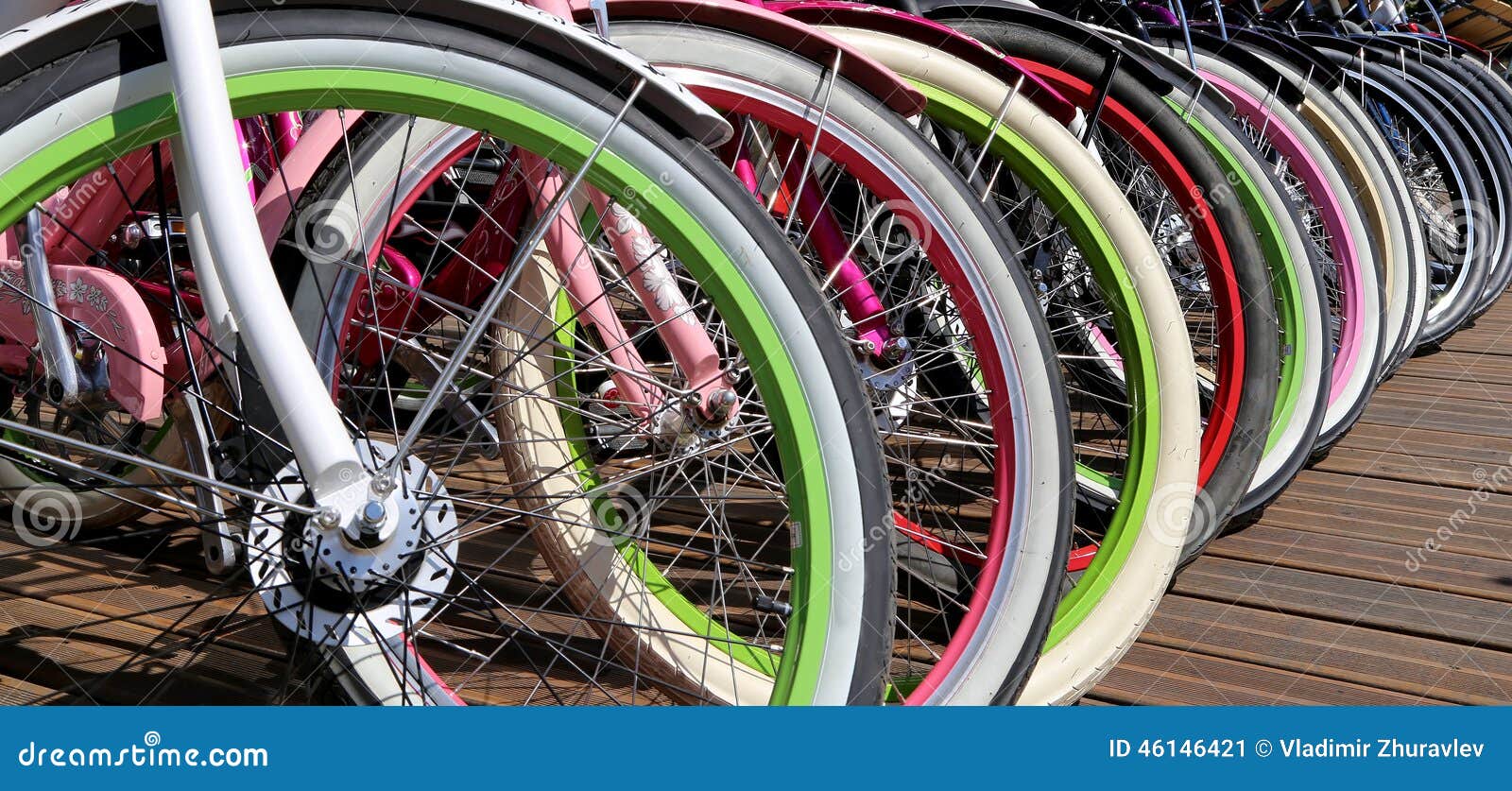 Row Multicolored Bicycle Wheels Closeup Stock Image - Image of wheel ...
