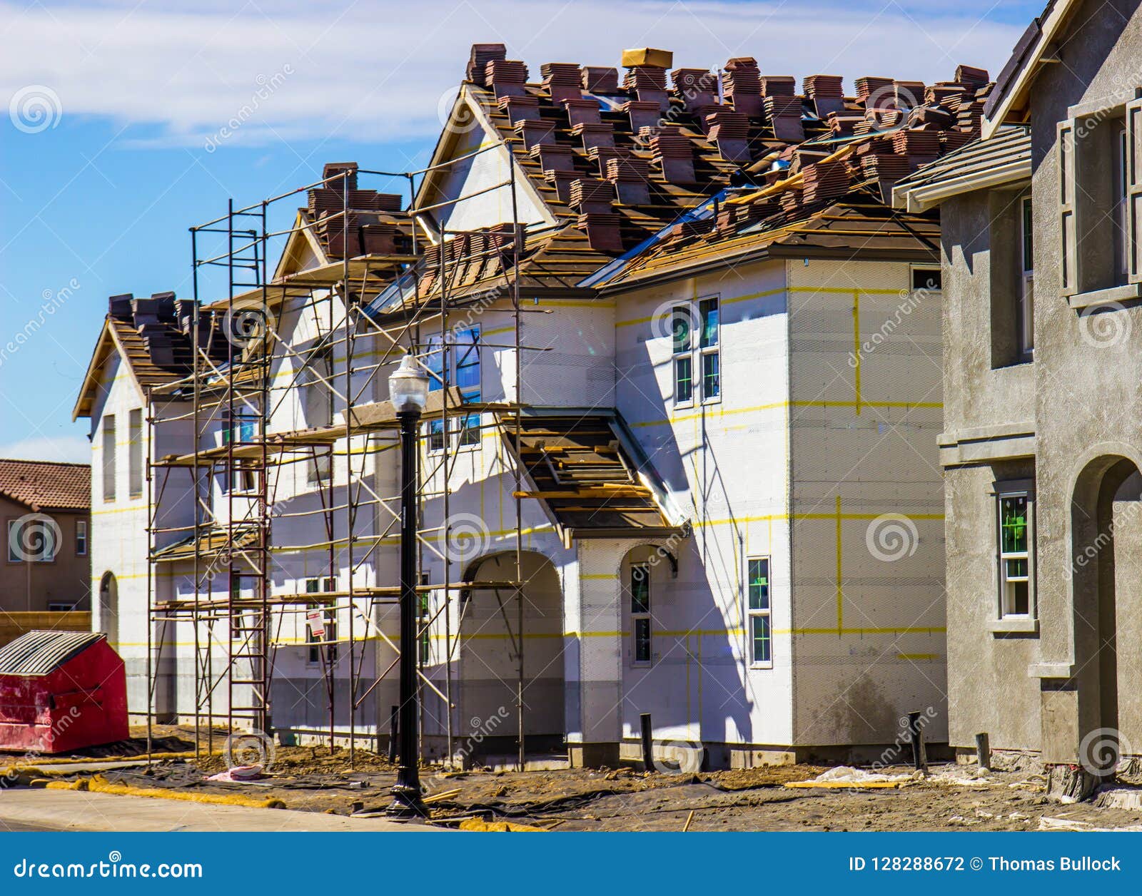 Row of New Homes Under Construction Stock Photo - Image of buildings ...