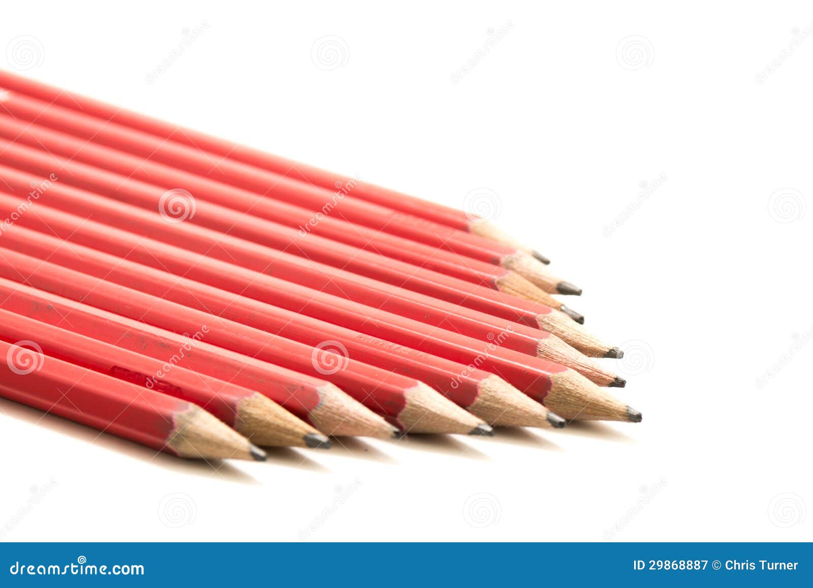 Row of Red Pencils in an Arrow Shape Stock Image - Image of multi ...