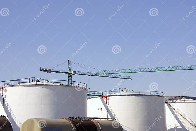 Row of oil storage tanks stock photo. Image of background - 5693206