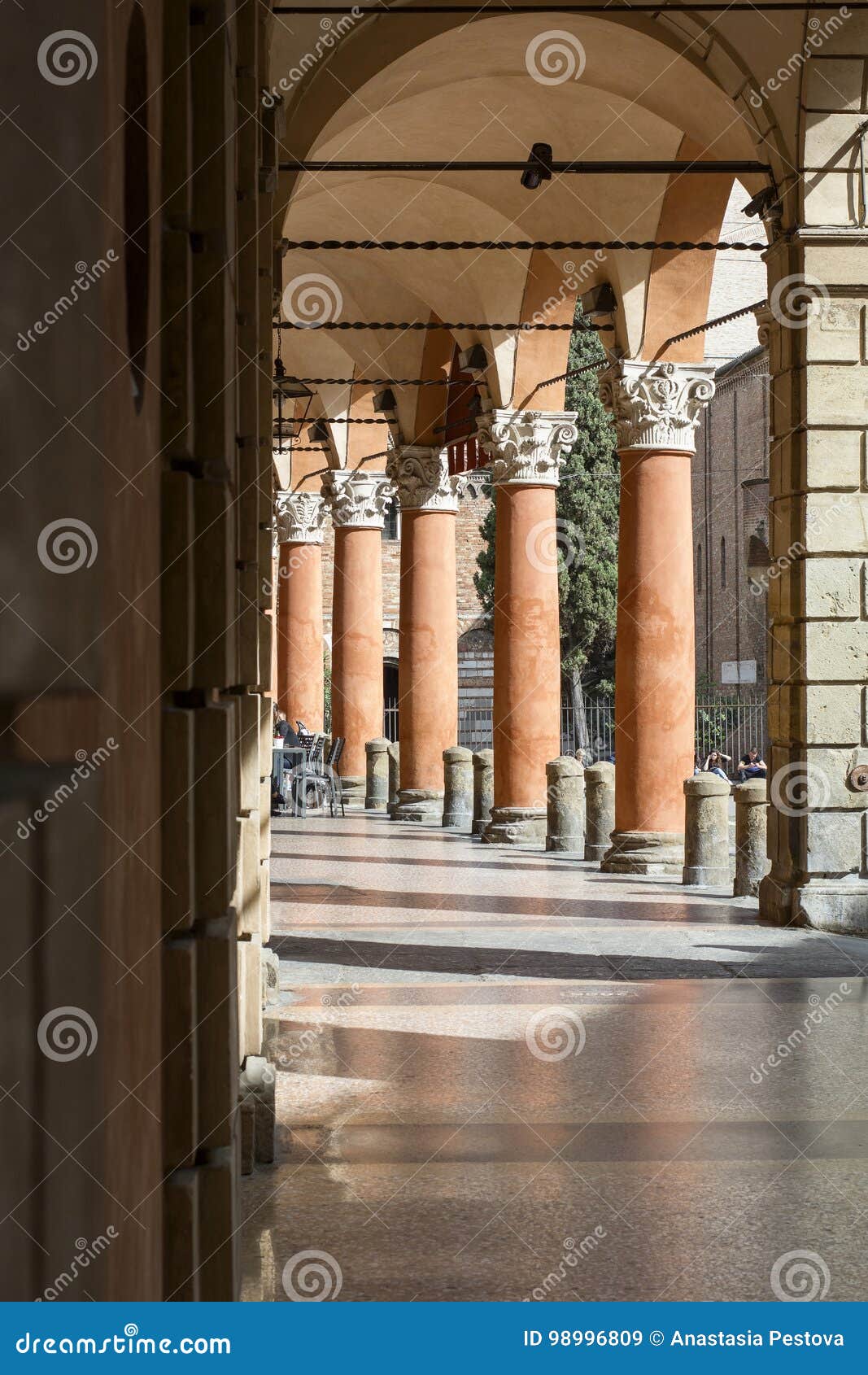 Row of Orange Columns in a Gallery in Sunlight Editorial Stock Image ...