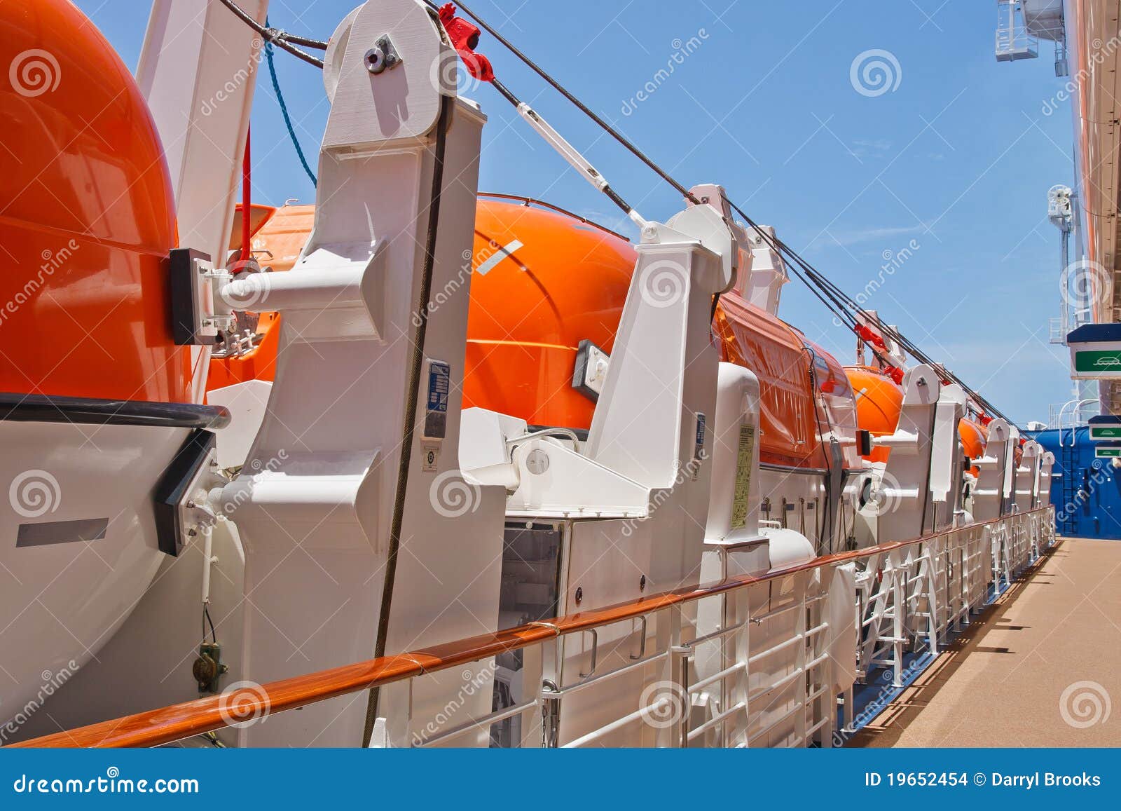 Row of Orange Lifeboats by Deck of Cruise Ship Stock Photo - Image of ...