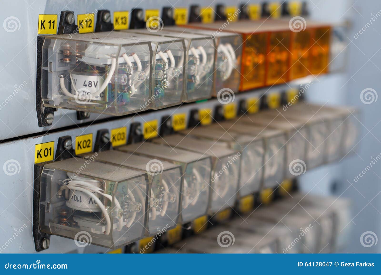 Row of Orange and White Relay Actuators Stock Image - Image of electric ...