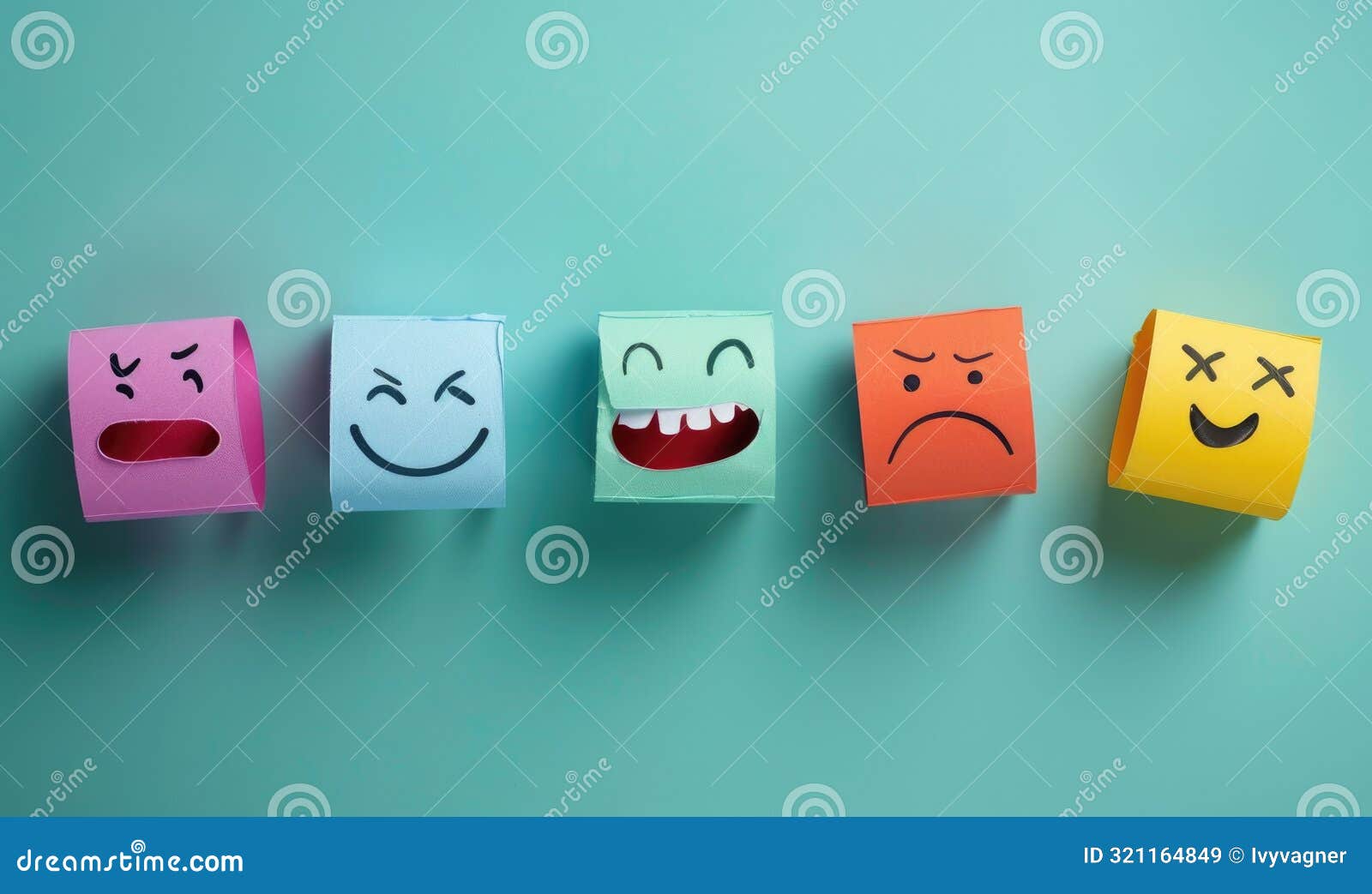 A Row of Paper Cutouts of Different Emotions, Including a Smiley Face ...